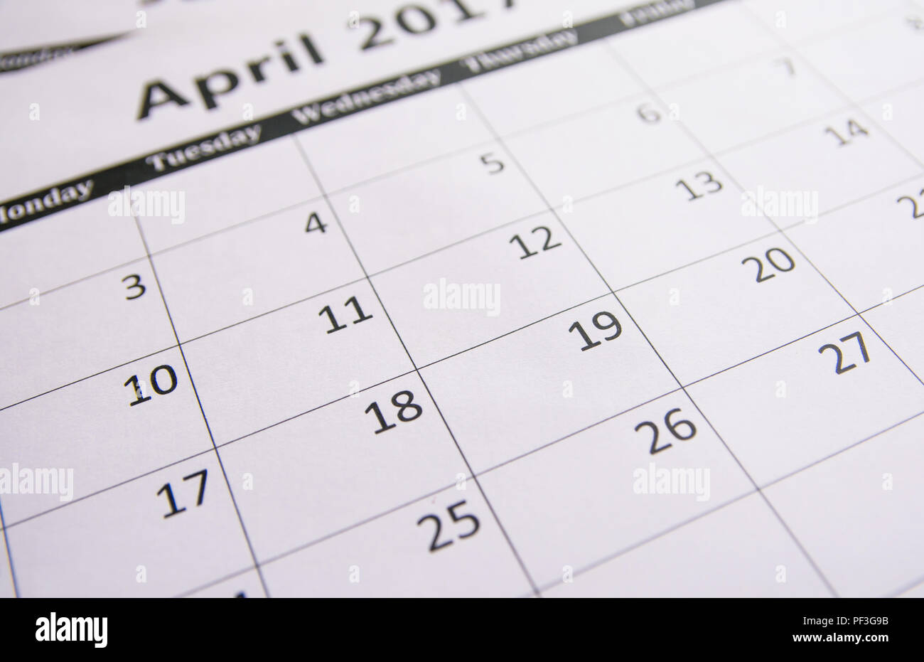 Close up calendar of page April background, Tax season Stock Photo - Alamy
