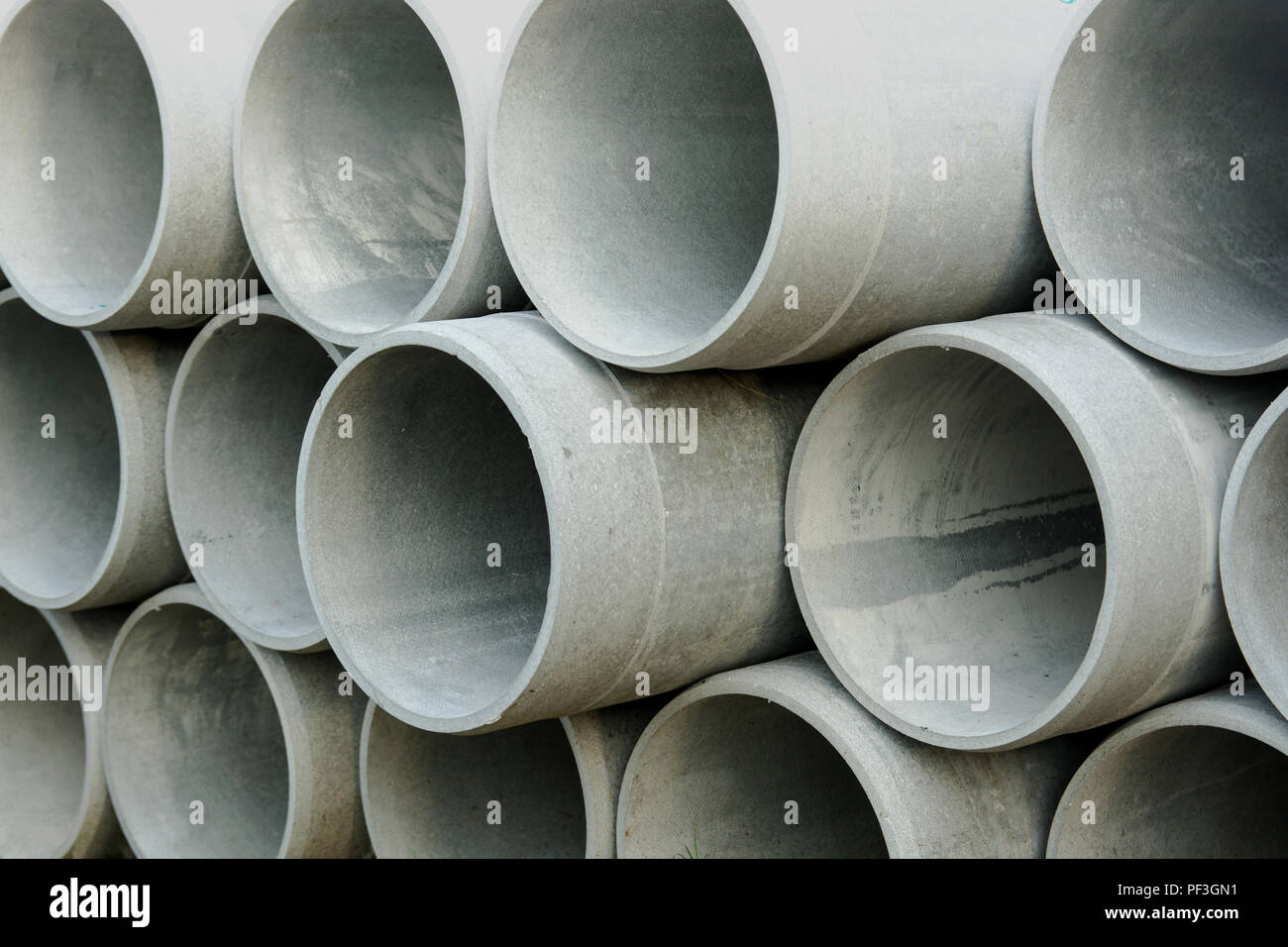 Close up concrete, cement pipes stacking, pattern background. concrete ...