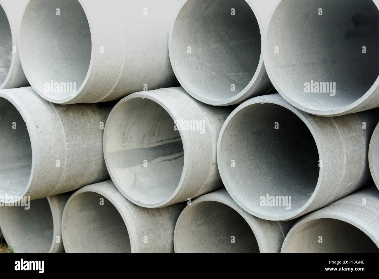 Close up concrete, cement pipes stacking, pattern background. concrete ...