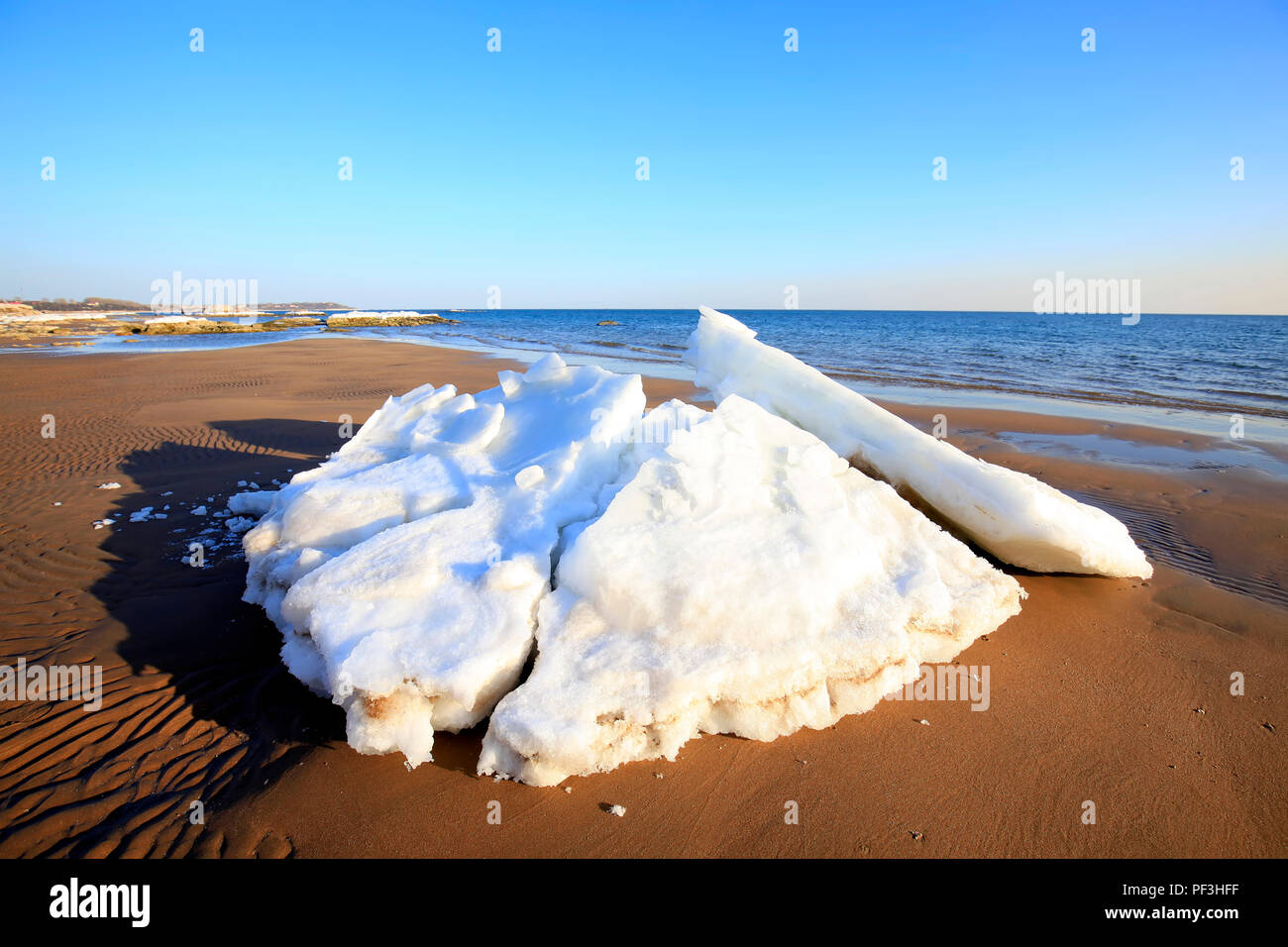 Ice and snow are on the beach Stock Photo - Alamy