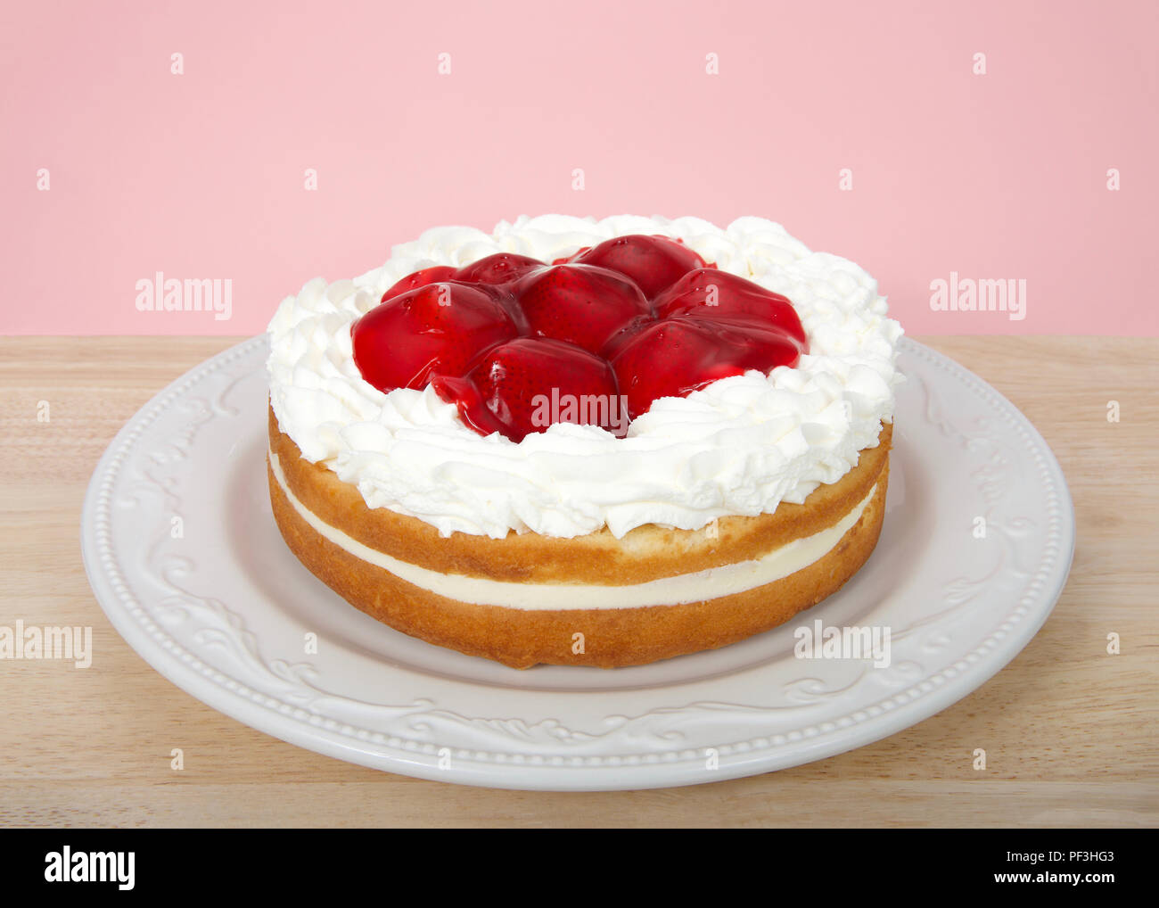 Light refreshing vanilla cake with cream filling, topped with whipped ...