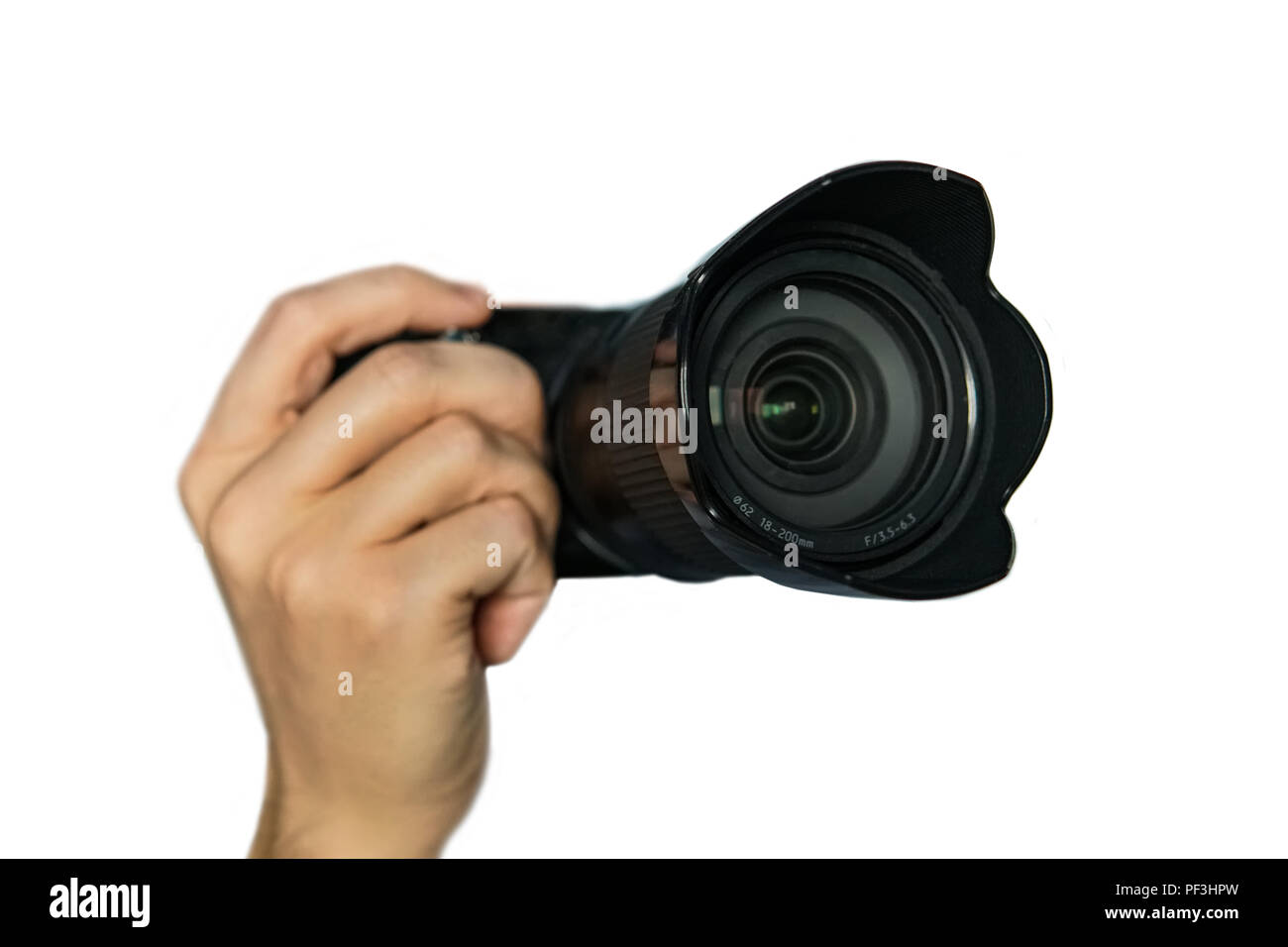 Photo camera in hand isolated on white background. Small size ...