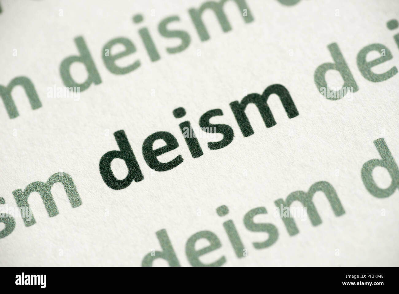 word deism printed on white paper macro Stock Photo - Alamy