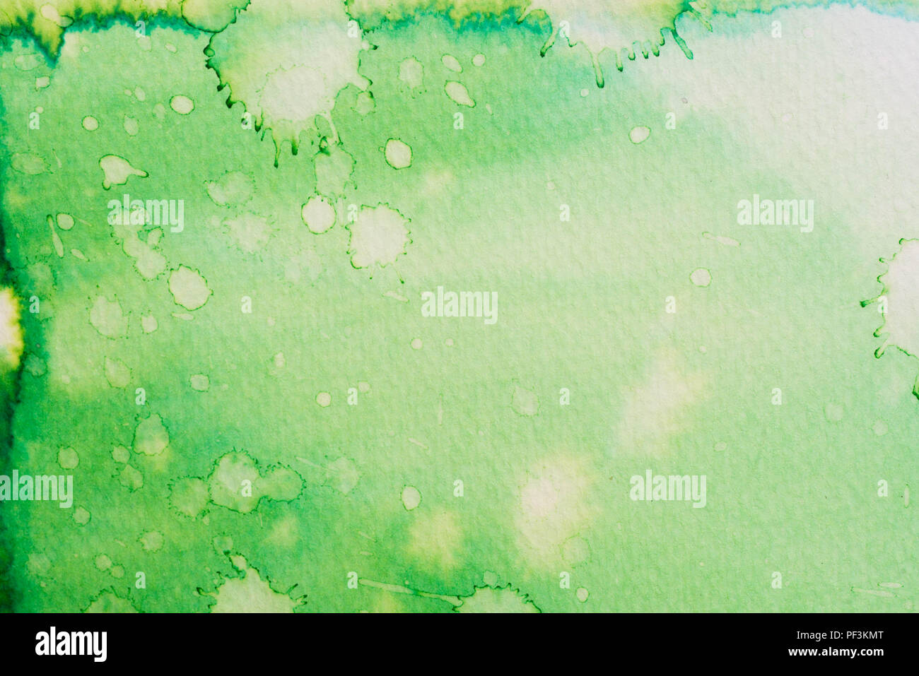 green color watercolor ink painted on paper background texture Stock ...