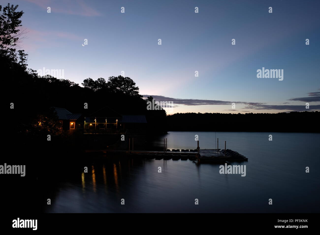 View of the park's boathouse during early morning twilight at Lake ...