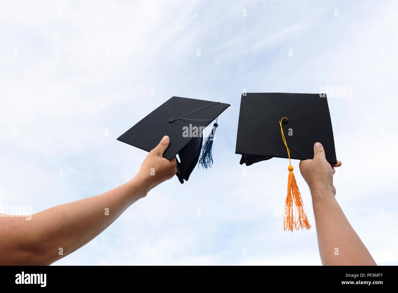 Hands holding diploma hi-res stock photography and images - Alamy