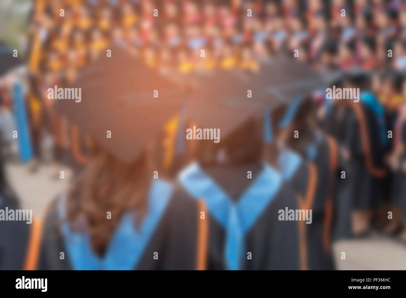 graduation Abstract blurry,Back of graduation with black blue tail cap ...
