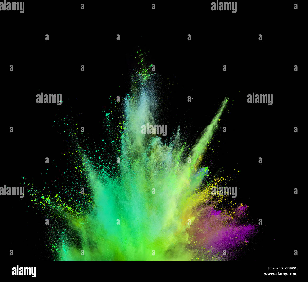 Explosion of coloured powder isolated on black background. Abstract ...
