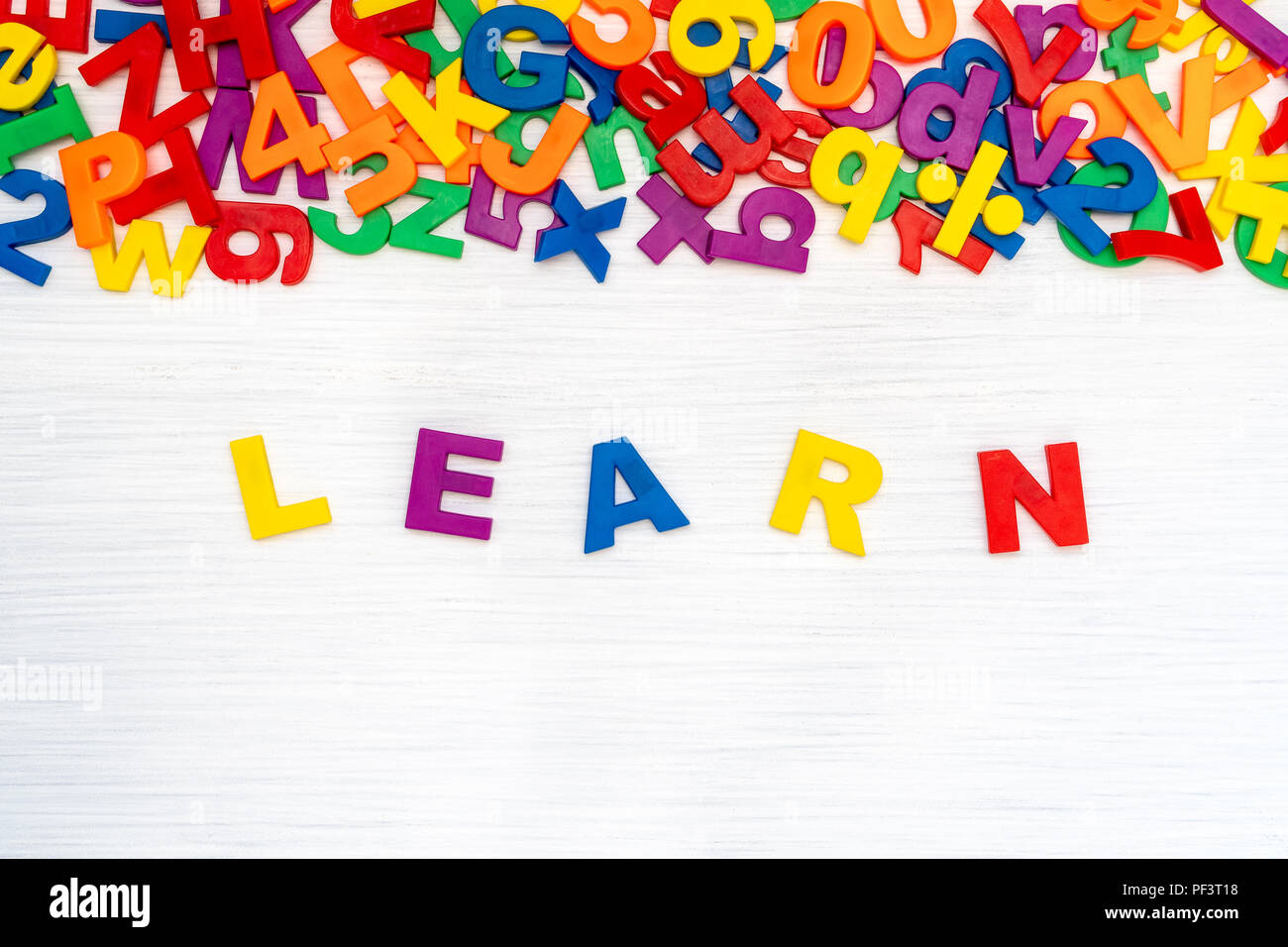 Learn word made by colorful plastic letters Stock Photo - Alamy