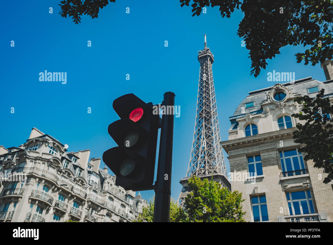 A traffic light with the Eiffel Tower in the background – August 2018 ...