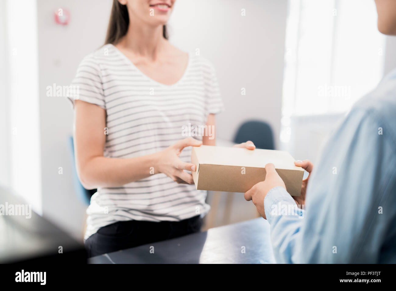 Customer in Shop Stock Photo - Alamy