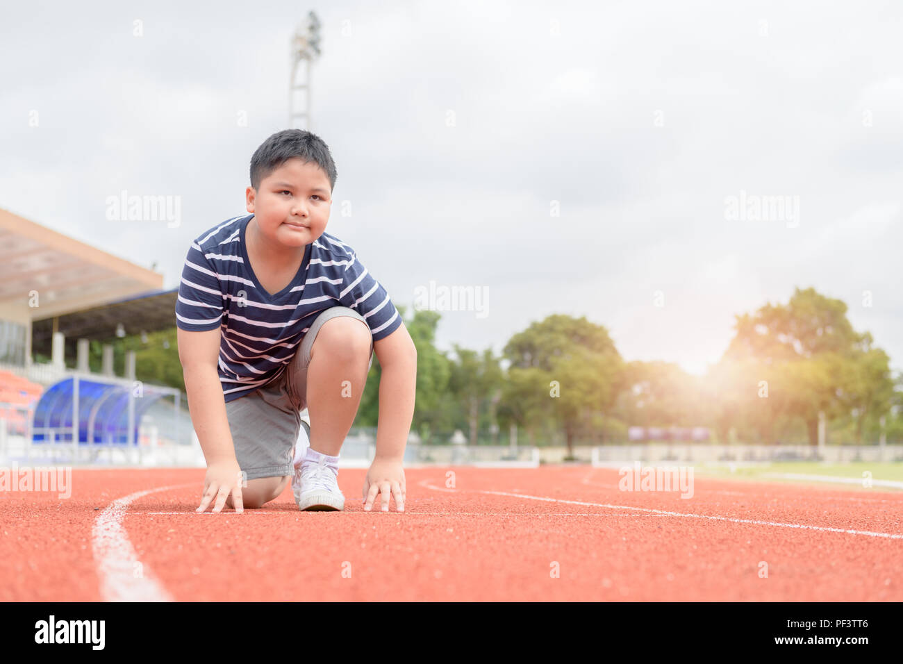 Boy race track start position hi-res stock photography and images - Alamy