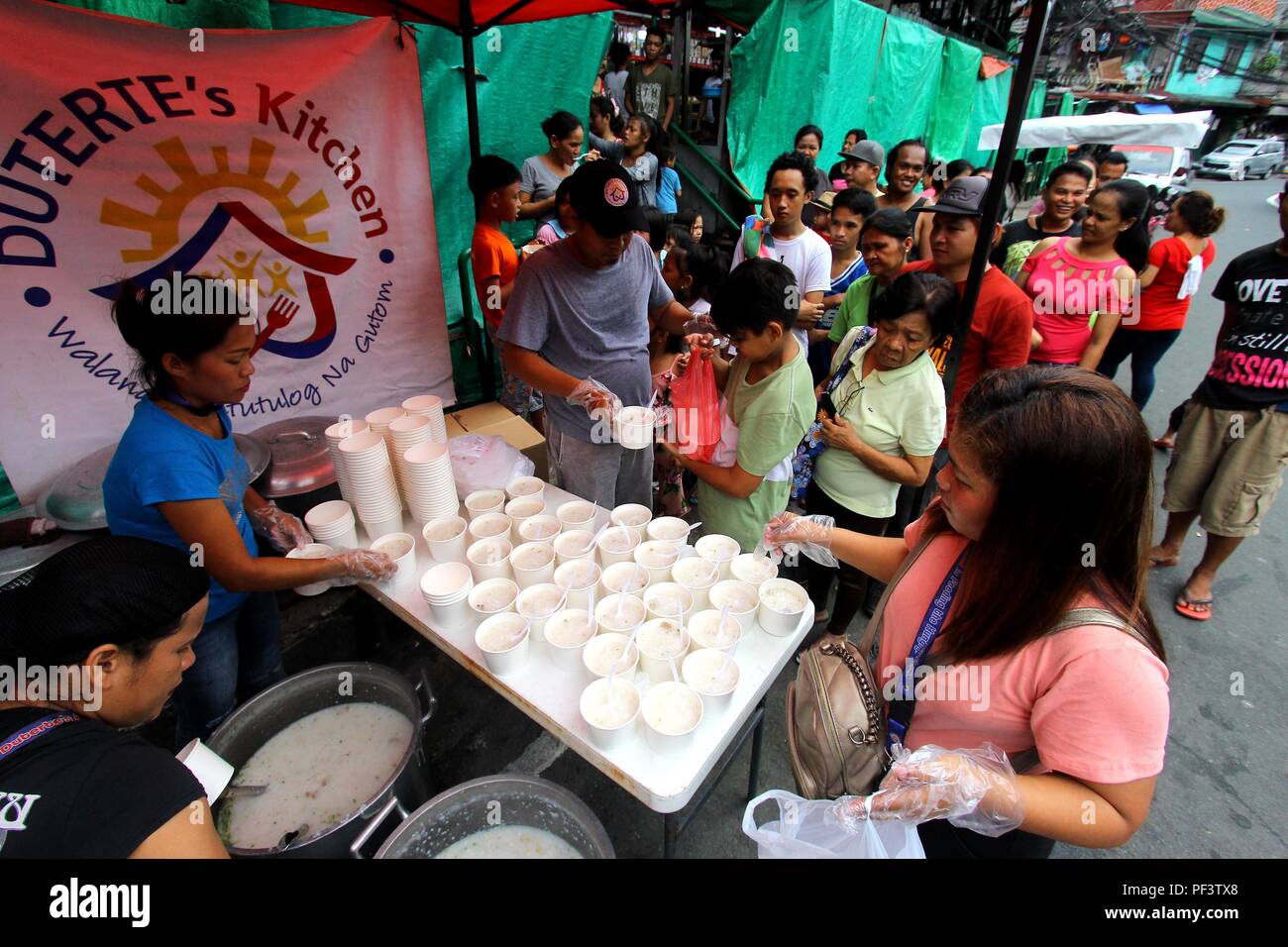 Philippines feeding program hi-res stock photography and images - Alamy