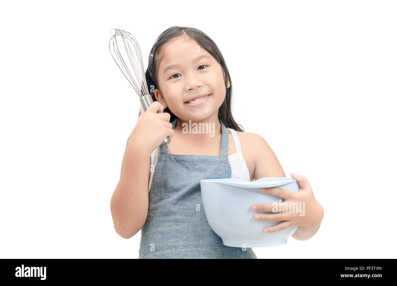Cute asian girl holding cooking utensils isolated on white background ...
