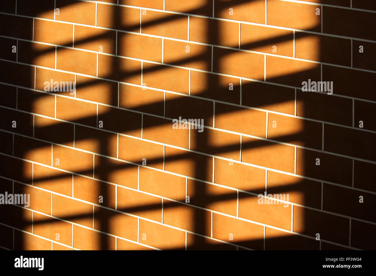 photo of shadow on tile wall as abstract background Stock Photo - Alamy