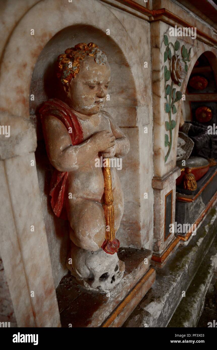 Mourning putti on tomb of Sir George St Paul in Snarford Church ...