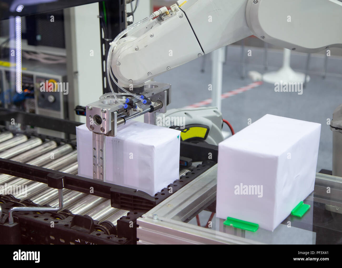 Industry Automated Robot Arm Loading And Unloading Box In Production