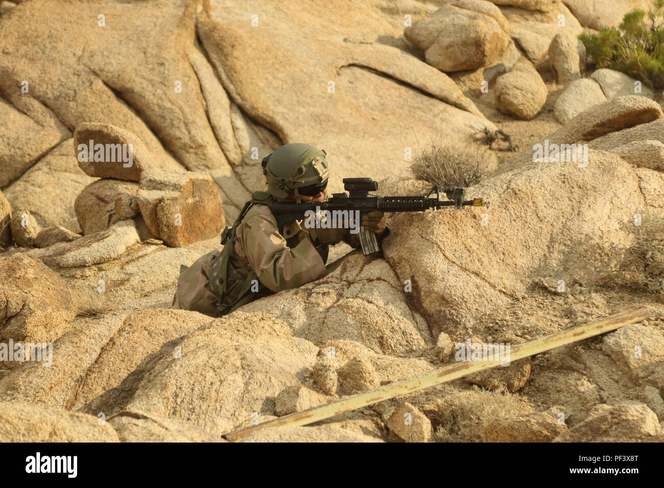 Cadet Paul Machete holds his position while awaiting assaulting ...