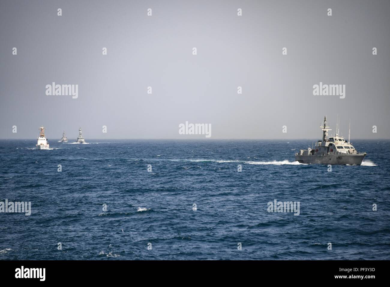 180813-N-RM440-2170 ARABIAN GULF (Aug. 13, 2018) From left to right, U ...