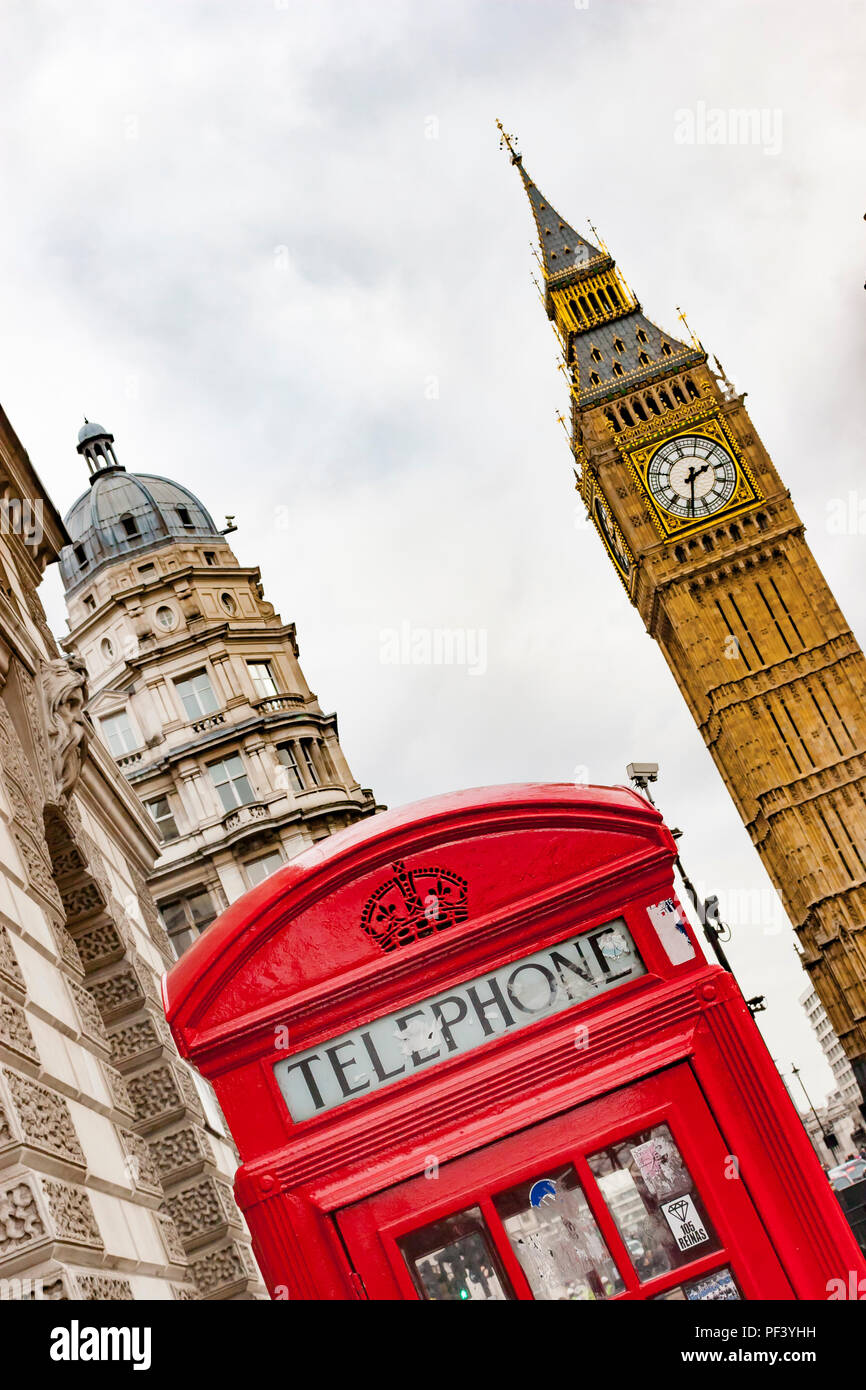 Red London telephone box with Big Ben behins Stock Photo - Alamy