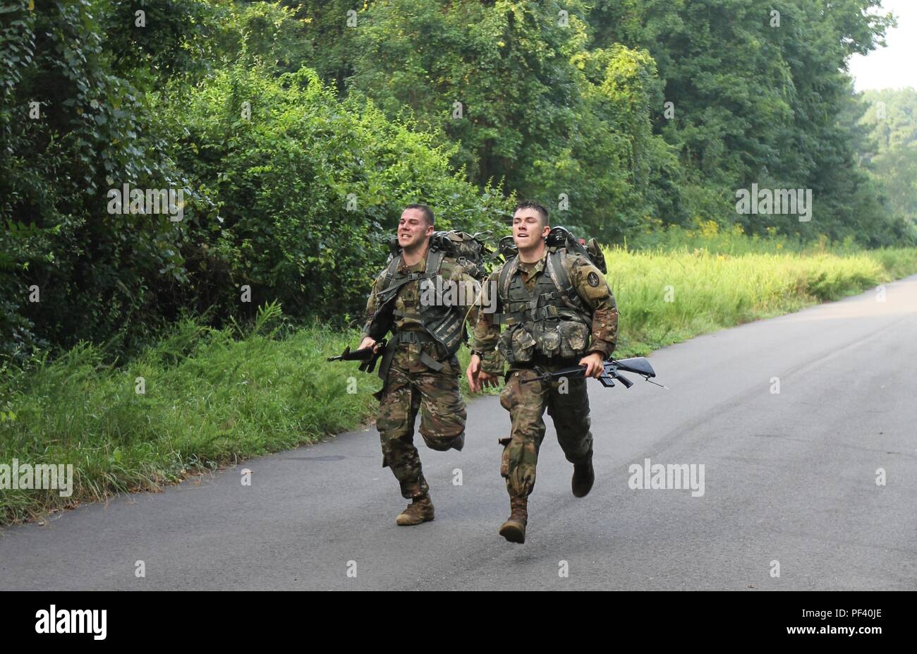 Spc. Tyler Gadapee, 21st Signal Brigade (left) and Pfc. Cameron Burgess ...