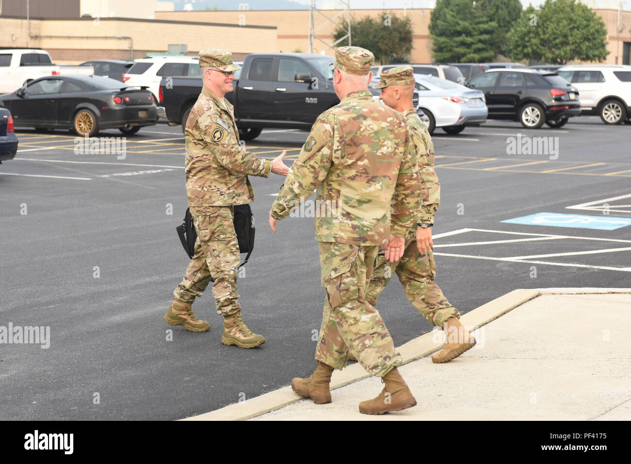 U.S. Air Force Chief Master Sgt. Gregory Smith, left, command chief master sergeant of Air Force ...