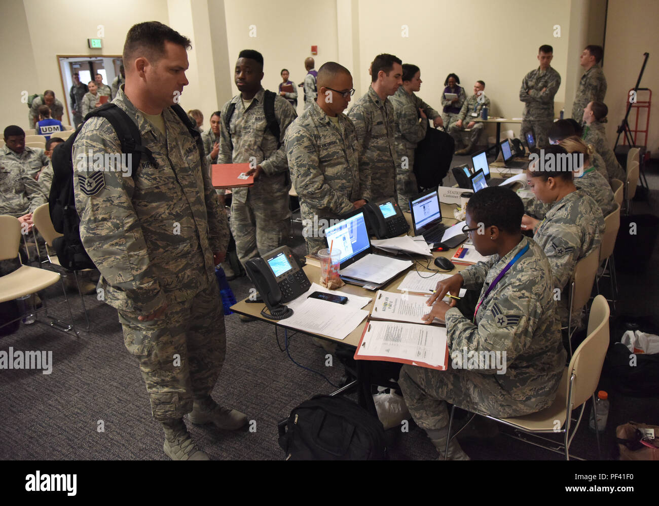 Keesler Airmen process through a deployment line during a deployment ...