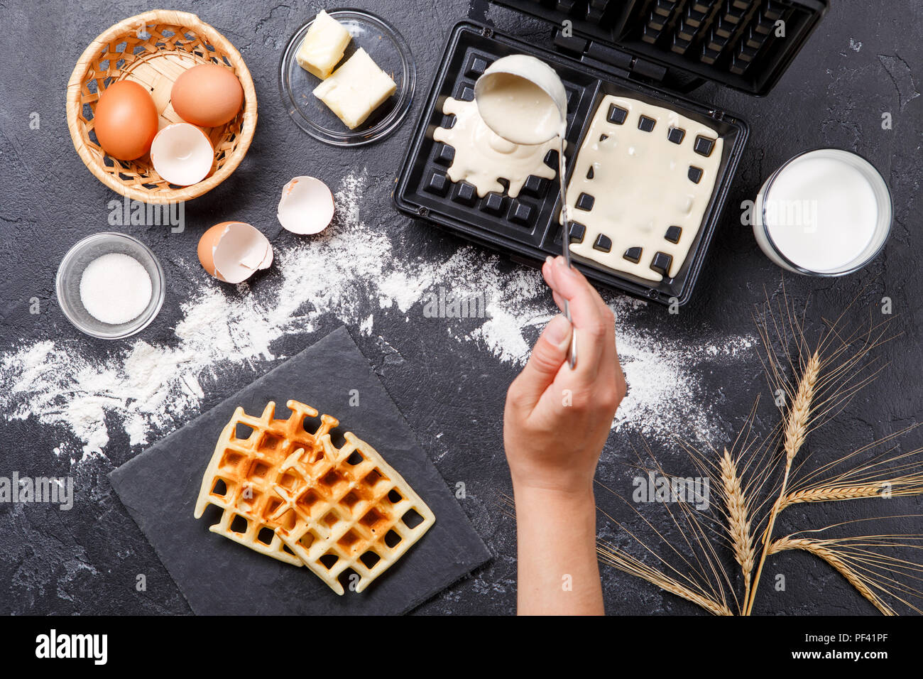 Photo on top of flour, eggs, waffle iron, spikelets, fresh roasted ...