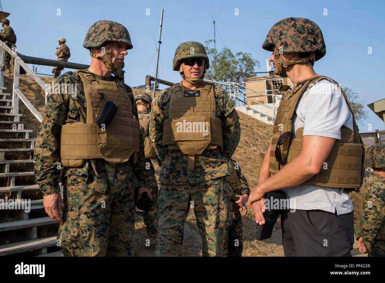 U.S. Marine Corps Maj. Gen. Kevin M. Iiams, left, commanding general of ...