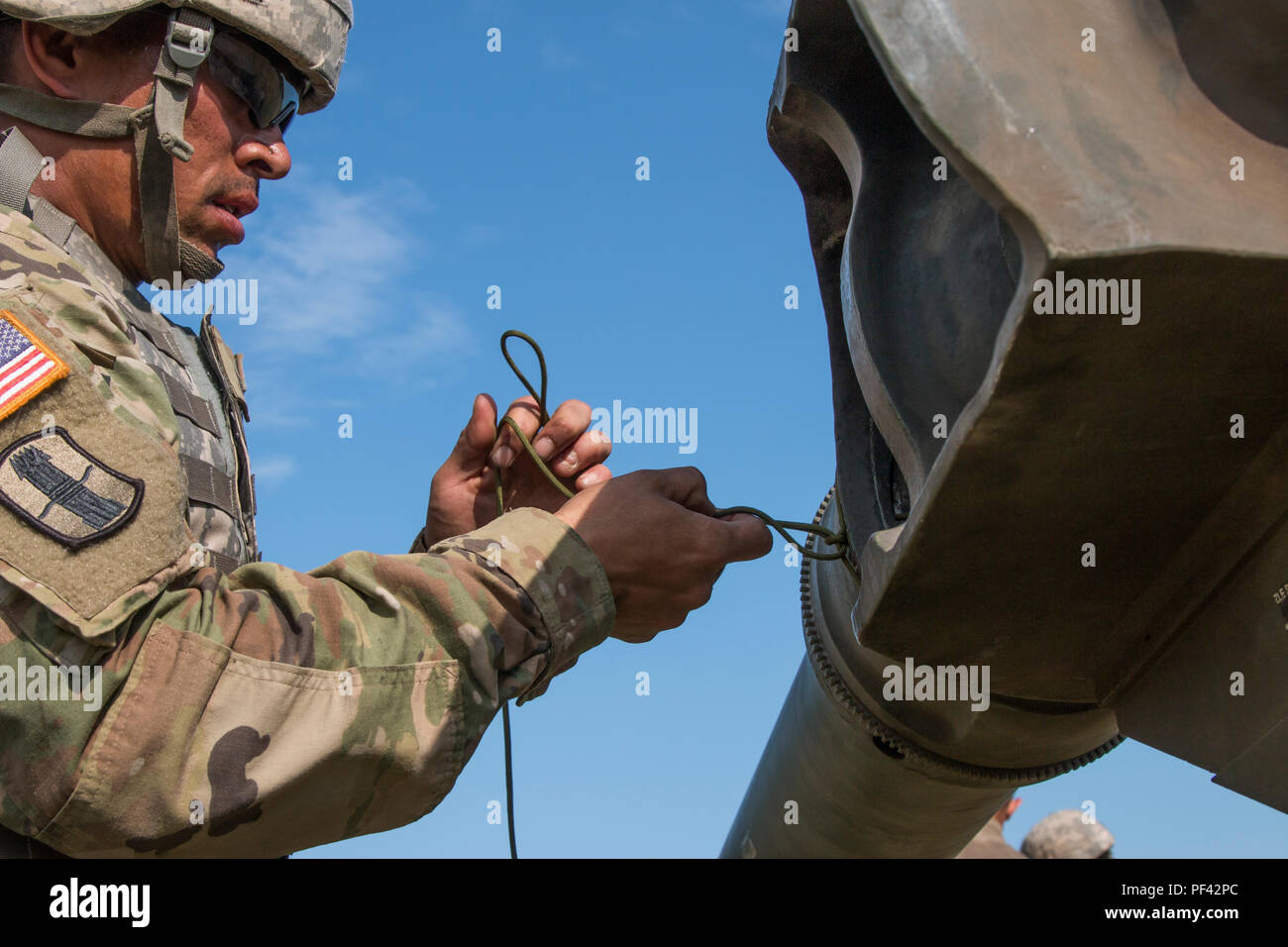 Sgt. Jason Insisiengmay, a canon crewmember with Battery B, 1st ...