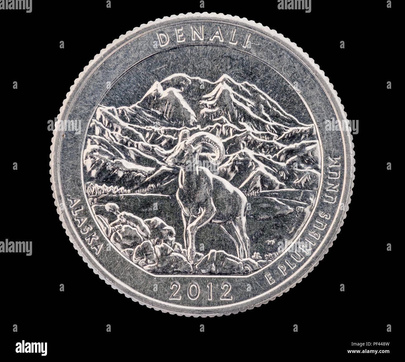 Denali Alaska commemorative quarter coin isolated on black Stock Photo ...