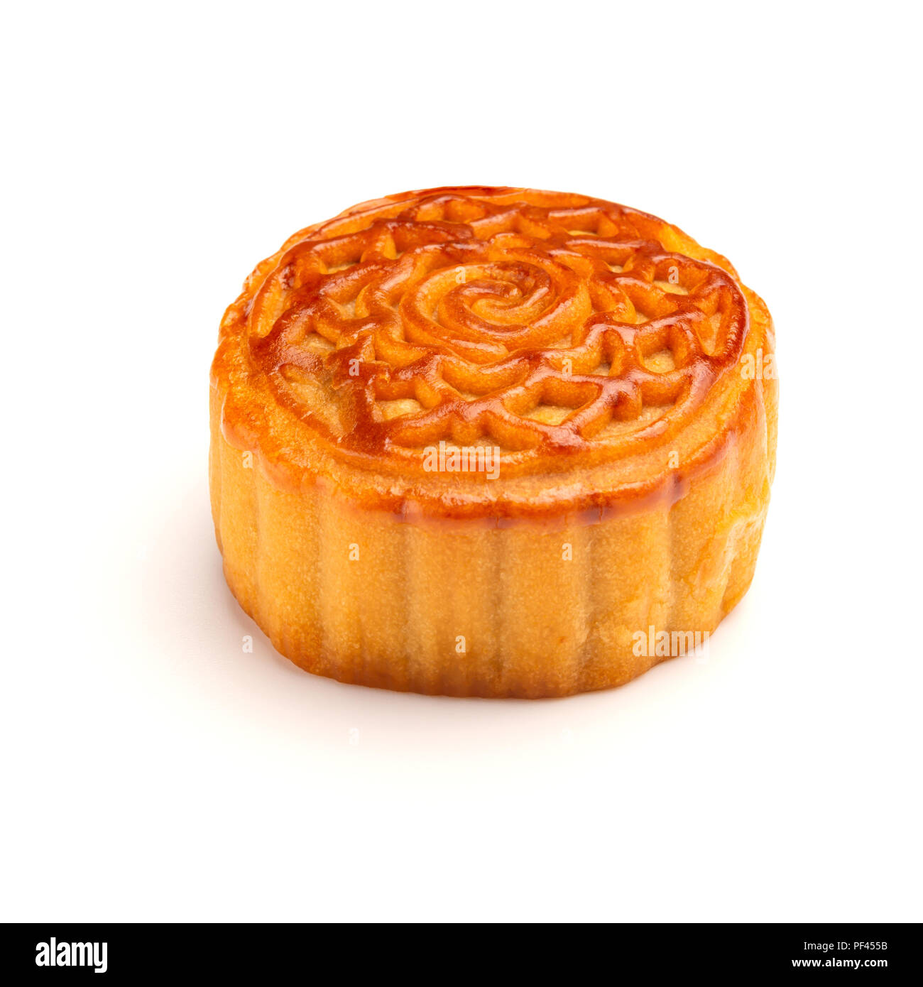 side view studio shoot of traditional Chinese mooncake on white Stock ...