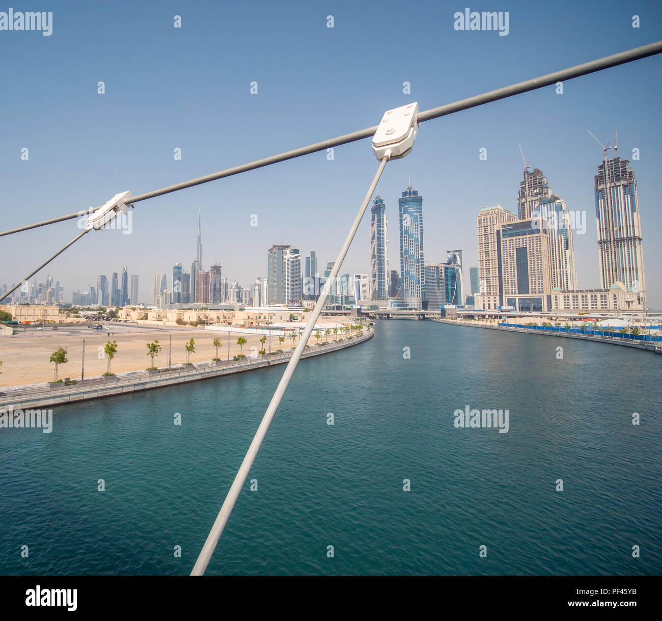 Panorama of the city of Dubai from the bridge of the river channel ...