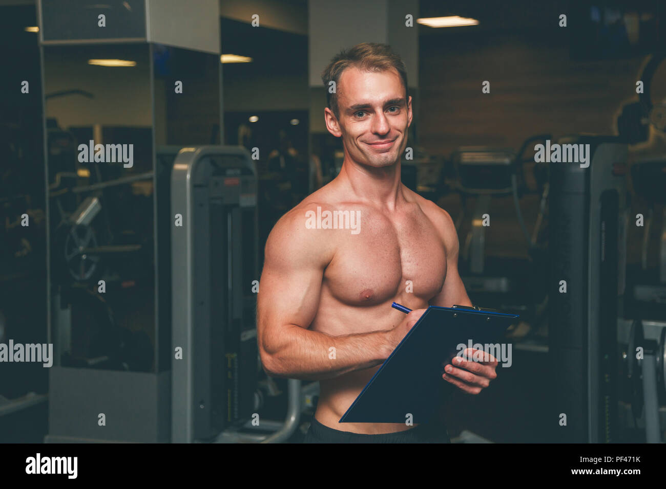Male personal trainer equipment hi-res stock photography and images - Alamy