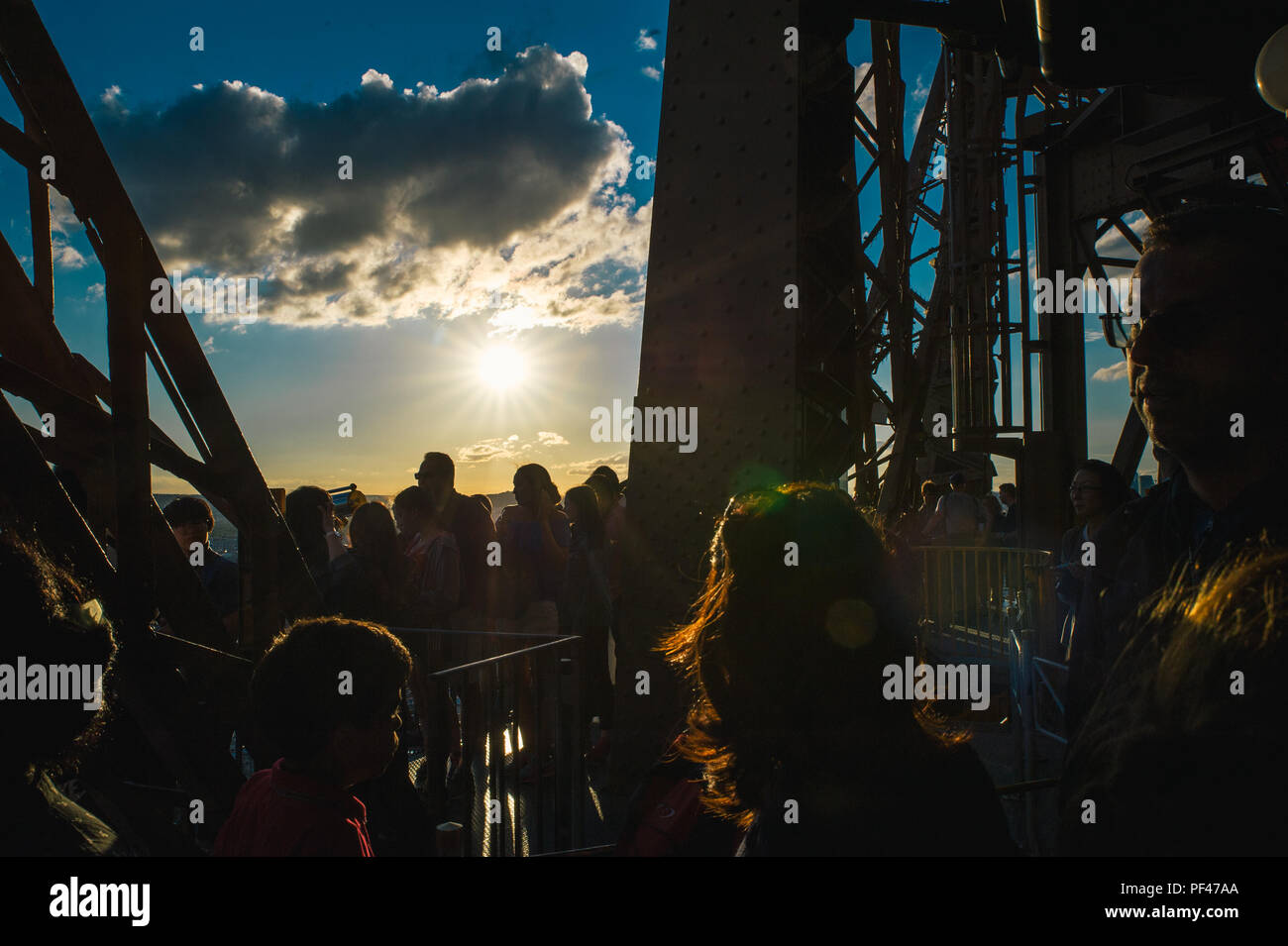 People on the observation deck at the top of the Eiffel tower during ...