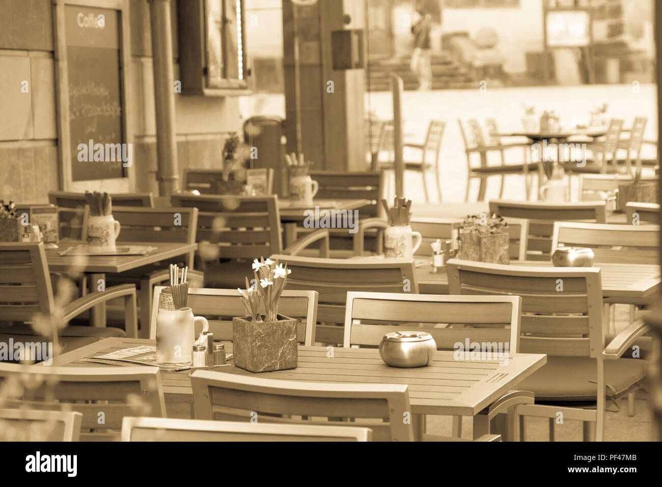 Table of a street cafe in a European city Stock Photo - Alamy