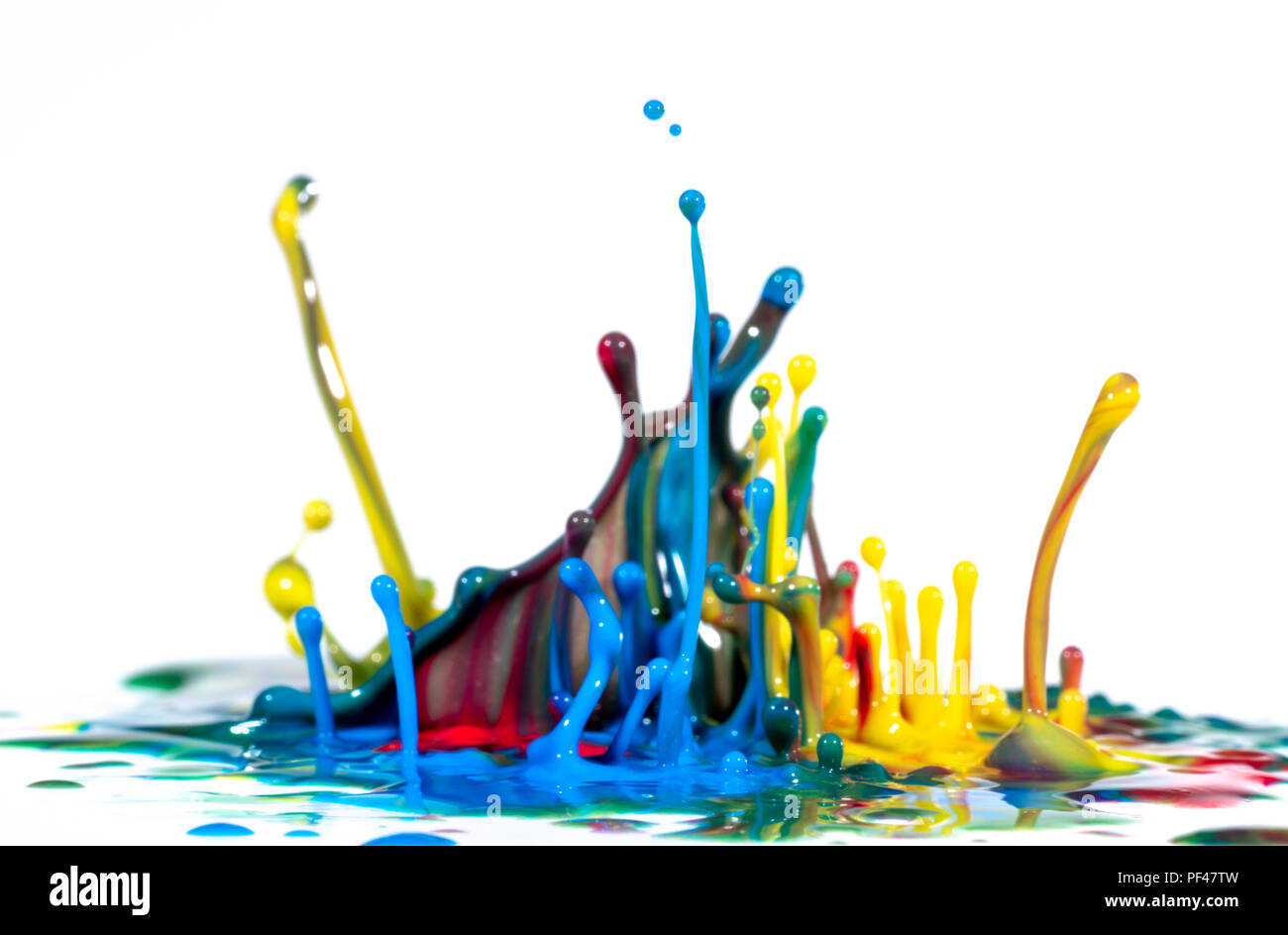 Splash of color ink on white background Stock Photo - Alamy