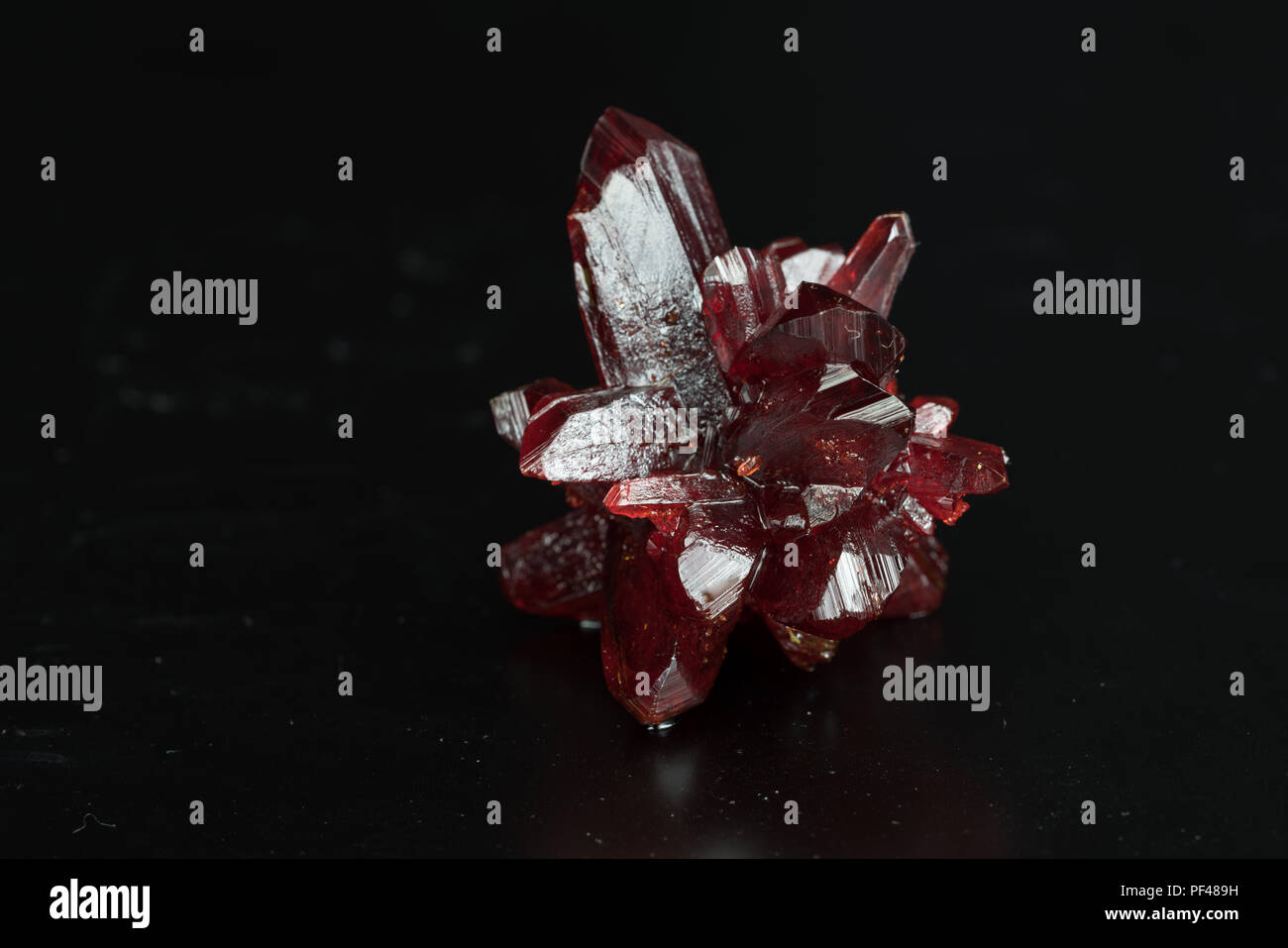 Red natural crystal. Natural mineral Stock Photo - Alamy