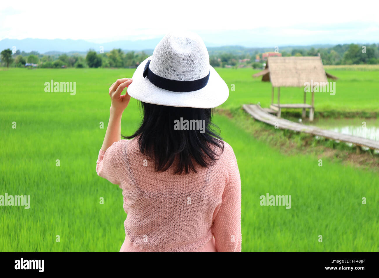 Girl walking rice field hi-res stock photography and images - Alamy