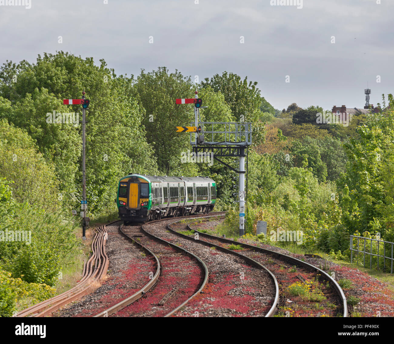 A West Midlands railway class 172 turbostar train ( 172334 ) under the ...