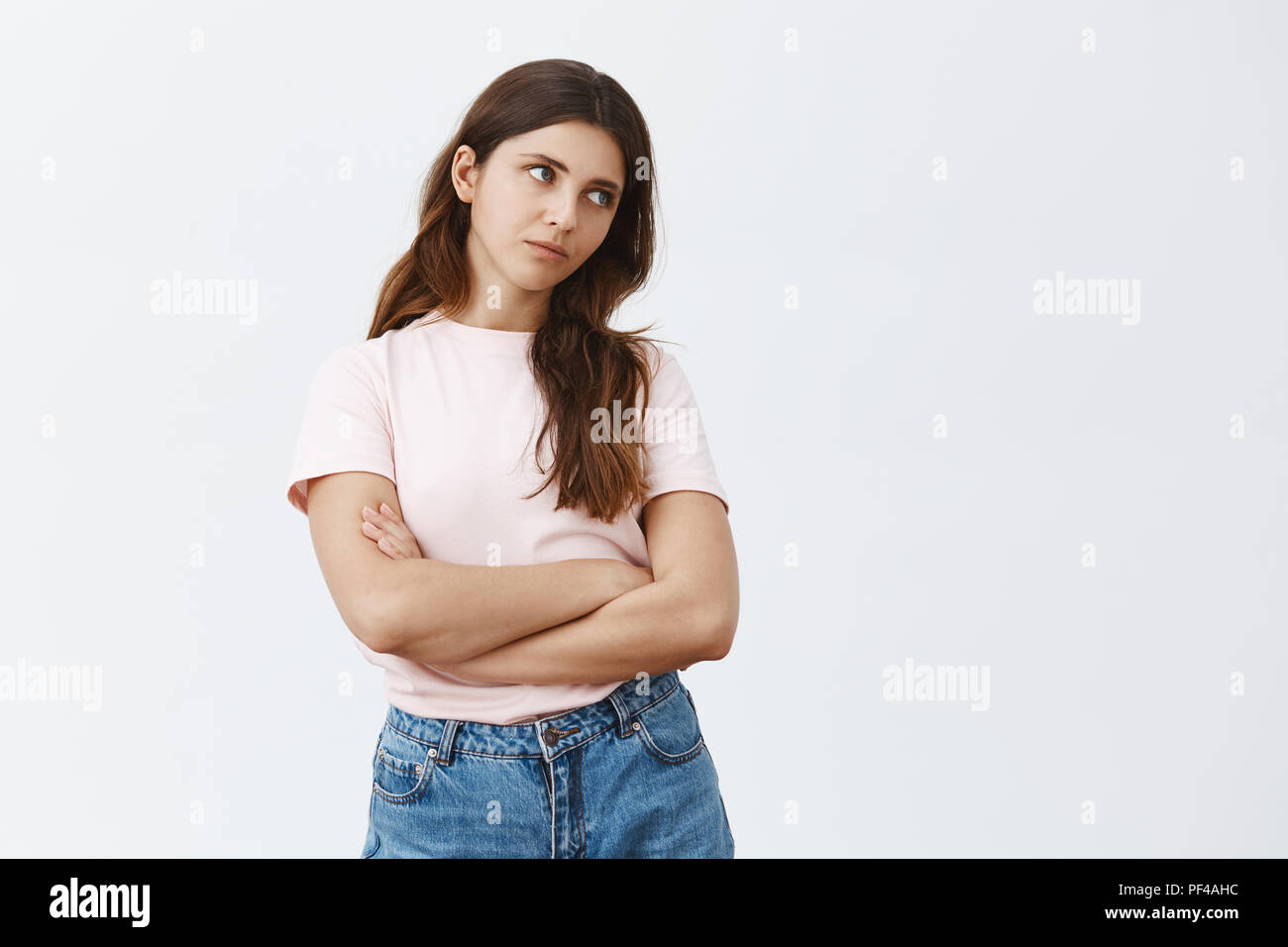 Indoor shot of pissed woman losing temper keeping silent being annoyed ...