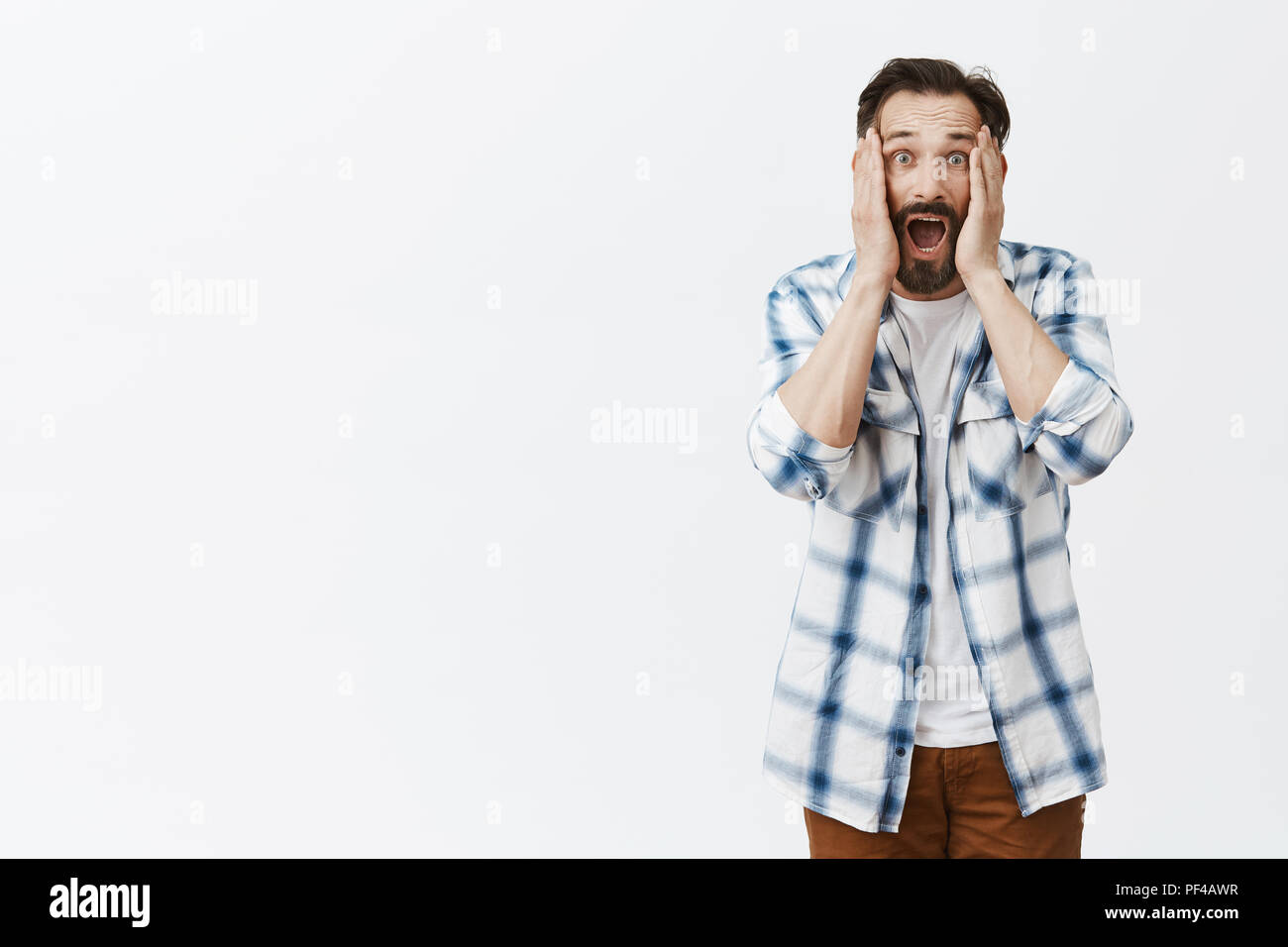 Man confused scared face hi-res stock photography and images - Alamy