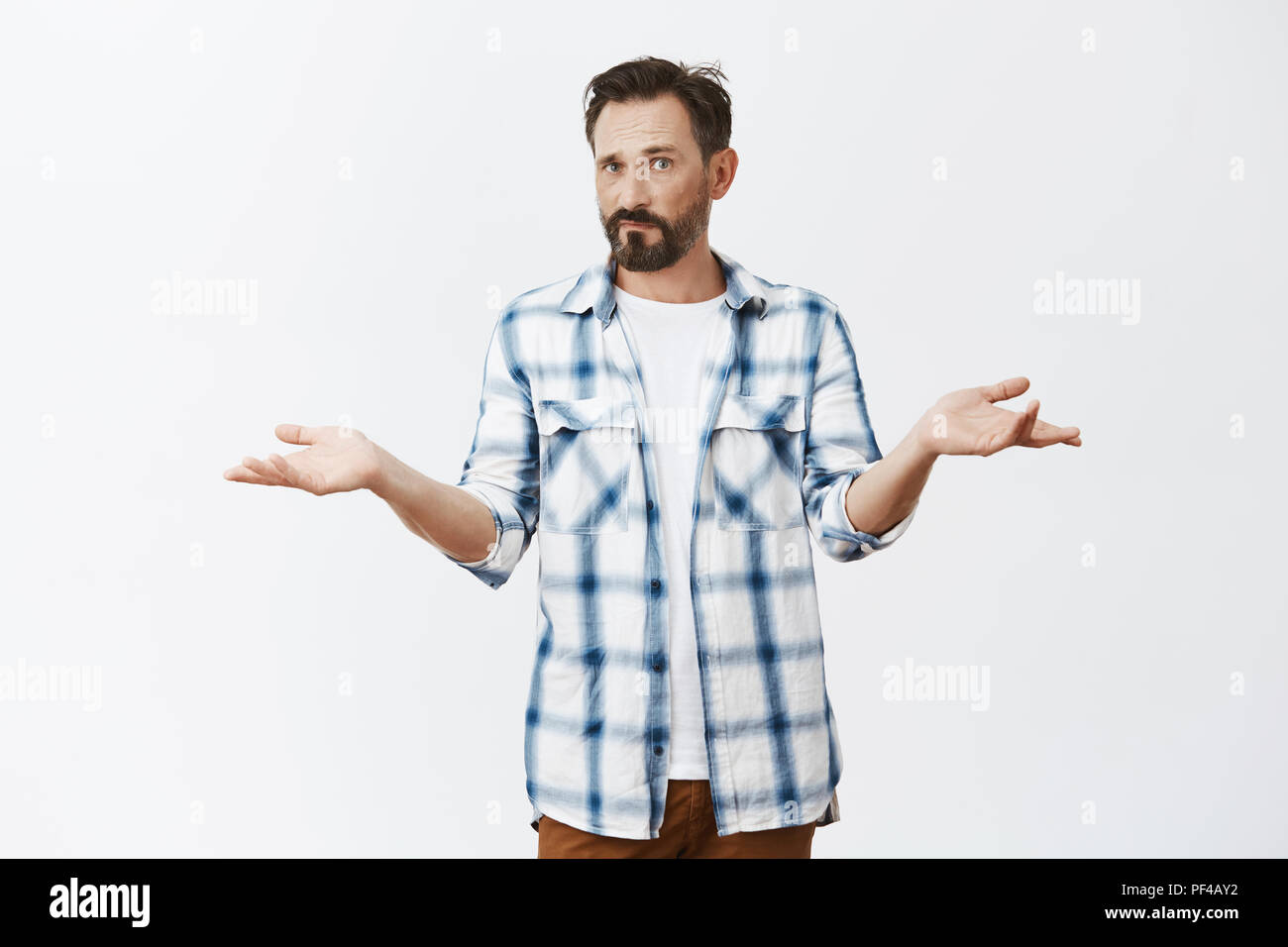 So what is our problem. Confused and puzzled handsome mature caucasian ...