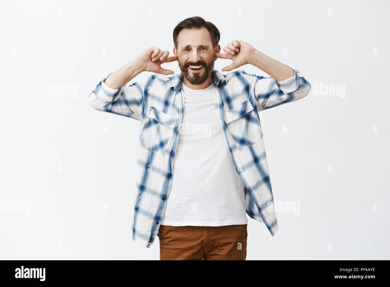 Turn loud music off, it is annoying. Displeased unhappy mature european ...