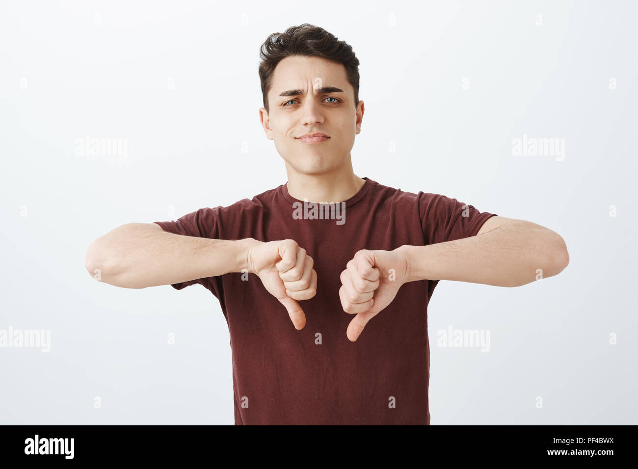 Idea sucks, dislike it. Portrait of unimpressed displeased handsome ...