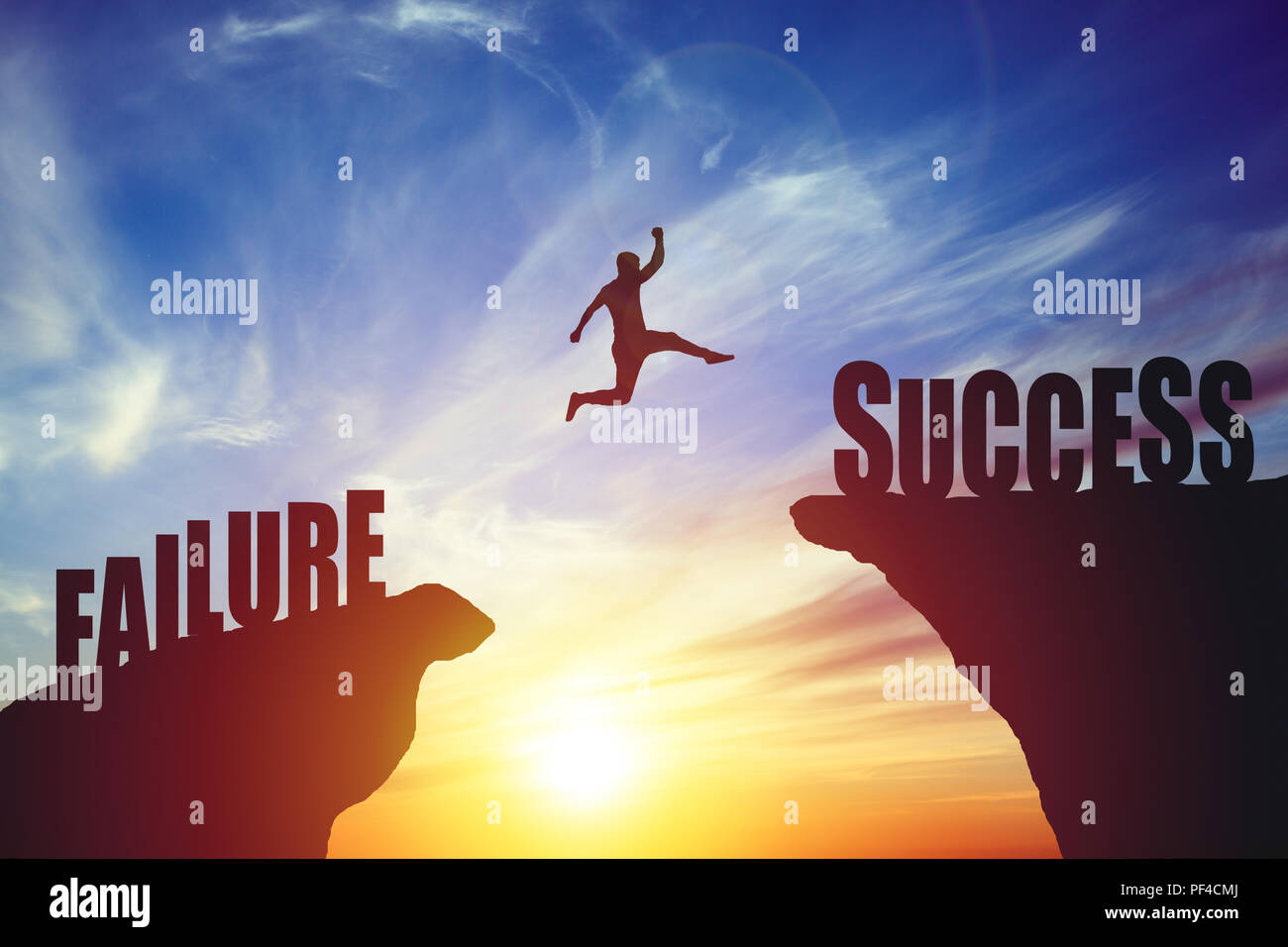 Silhouette of business man jump to success text over a beautiful high ...
