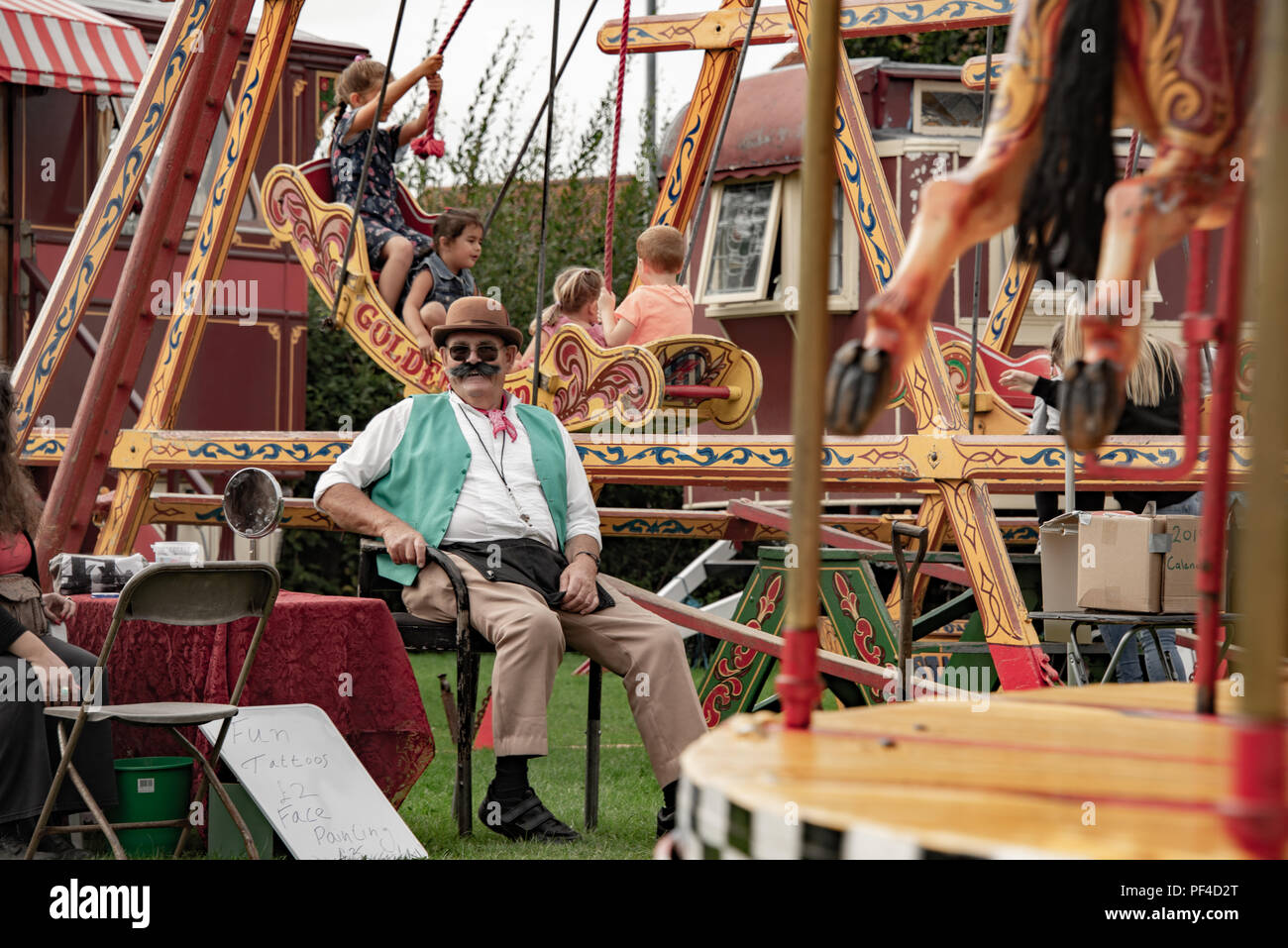 Swing boats at fairground hi-res stock photography and images - Alamy
