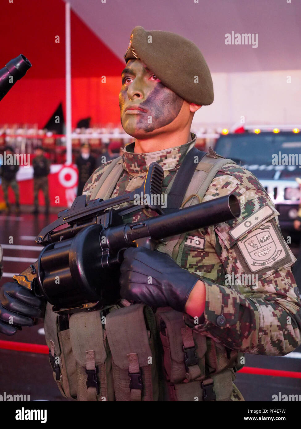 Peruvian soldier with a grenade launcher at the traditional Military ...