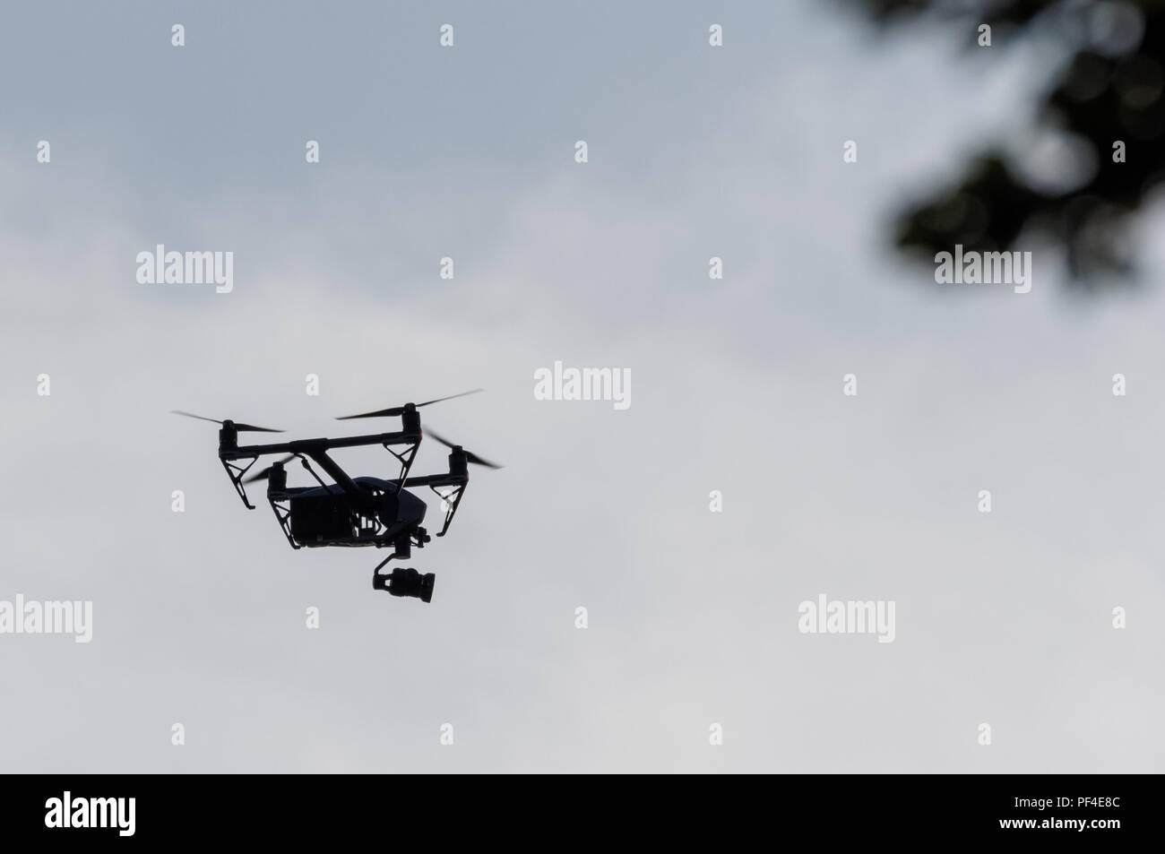 Flying drone with a camera Stock Photo - Alamy