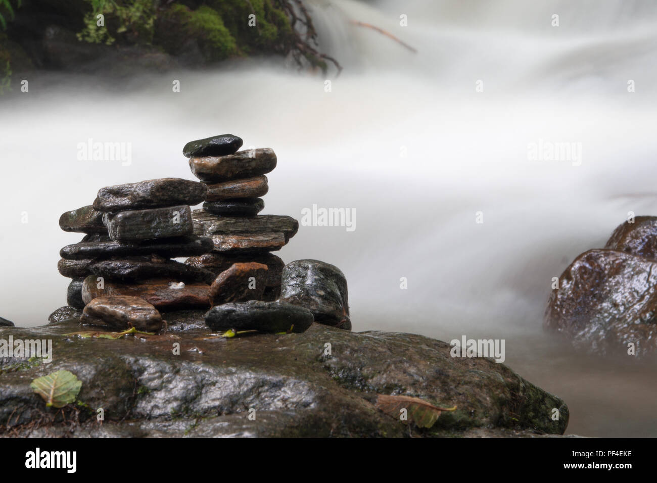 ZEN BALANCING ROCKS NEAR RIVER Stock Photo - Alamy